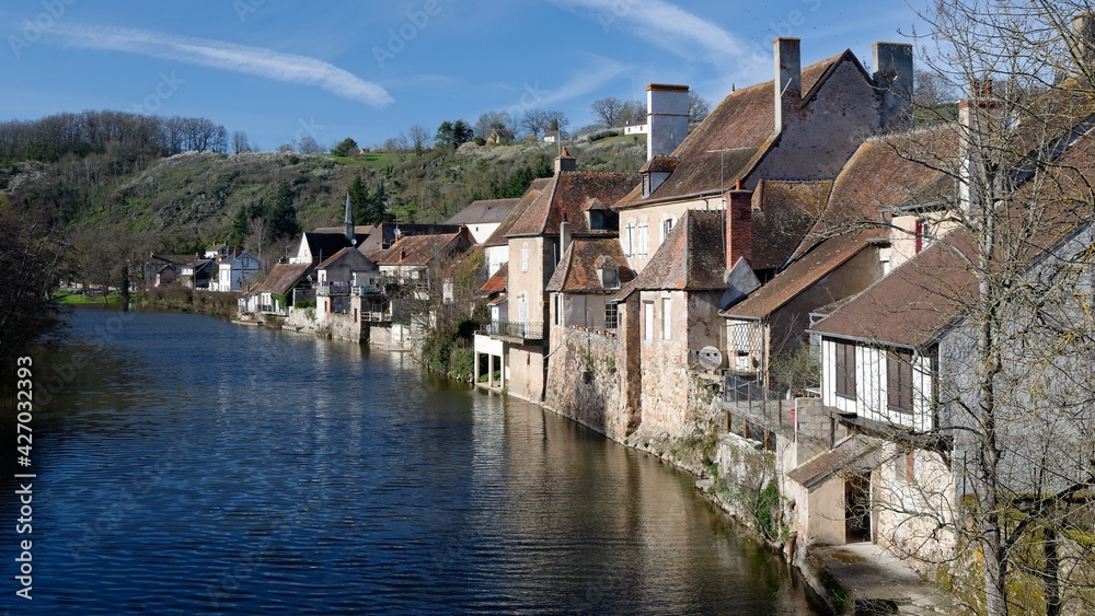 A view of the houses of an medieval french village, aligned along a ...