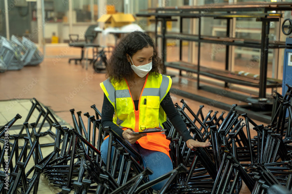 Engineer women wearing protection face mask are working and checking ...