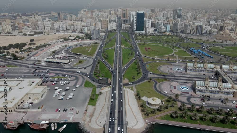 2021: Drone view of Sharjah's Khalid Lake and city skyline on a bright ...