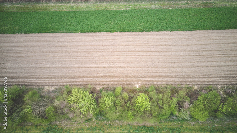 Top down view of ploughed agricultural fields photographed with drone ...