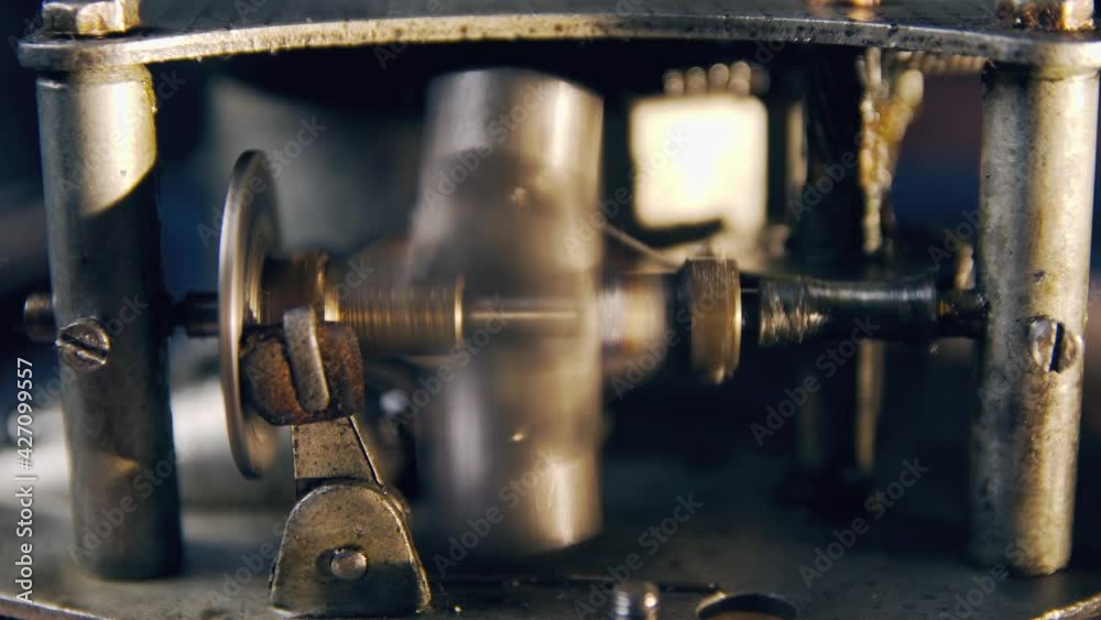 Macro detailed shot of the internal mechanisms of a classic gramophone ...