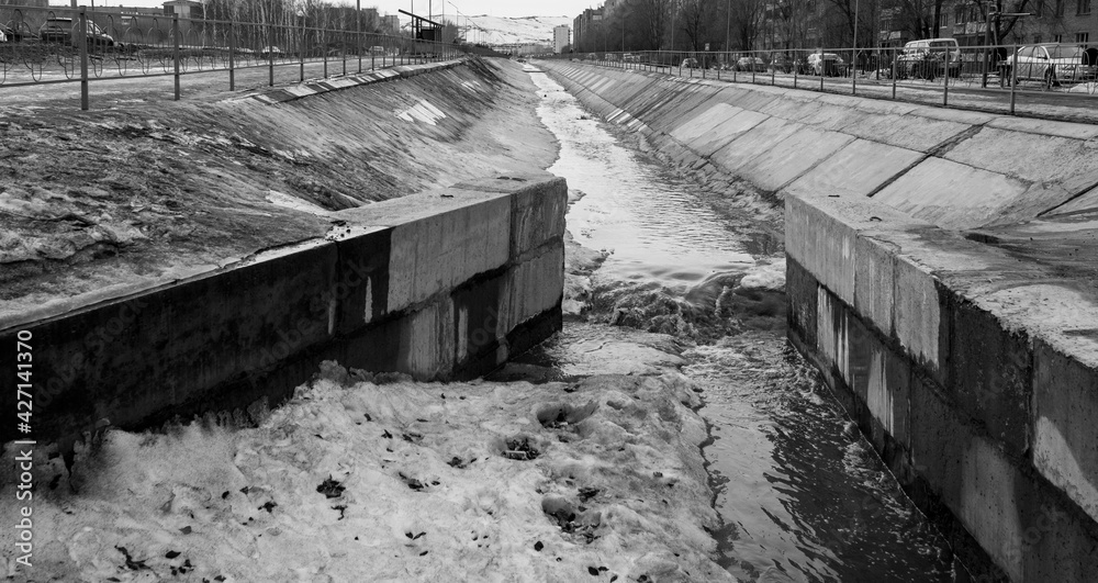 City Canal Drainage to prevent floods. Concrete drainage channel for ...