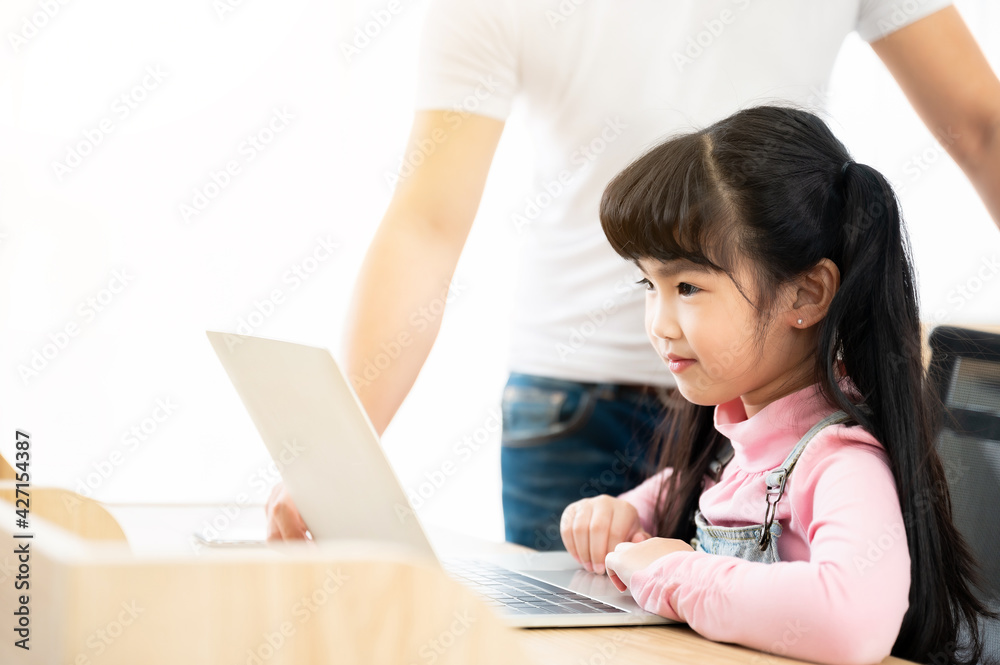 Asian girl student online learning class study using laptop and parent ...