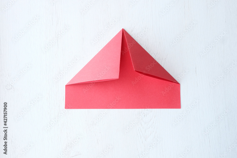 A sheet of red, blue paper. Step-by-step instructions on how to make an ...