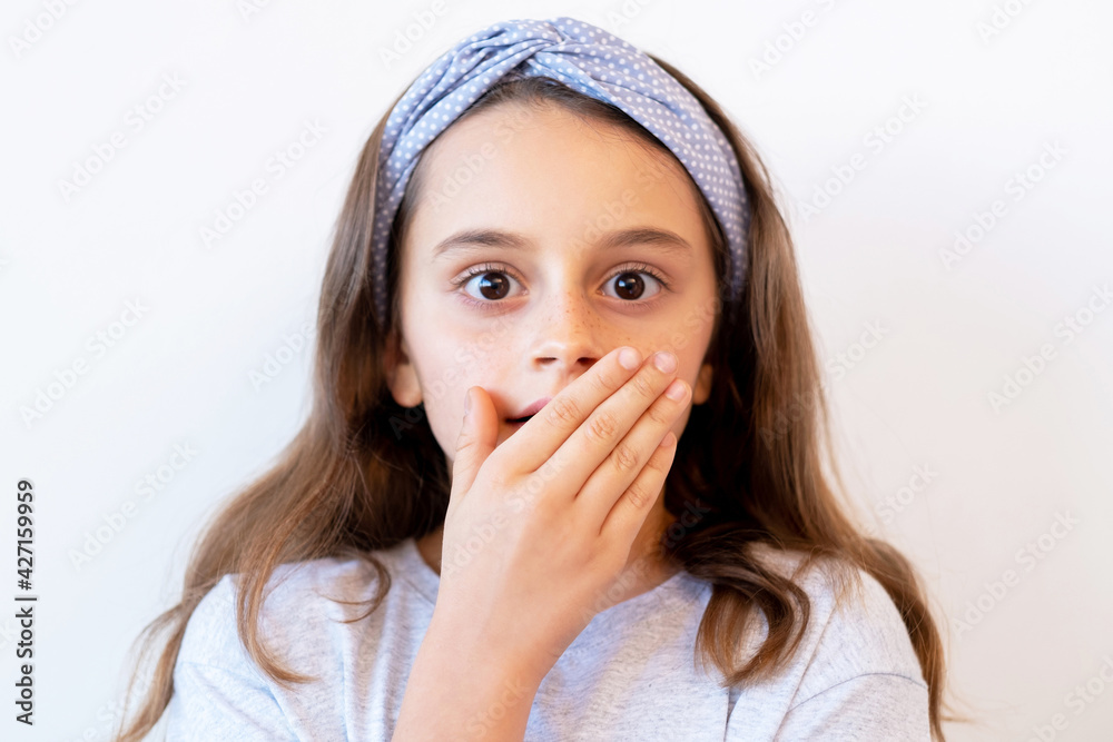 Surprised child portrait. Special offer. Exciting news. Impressed ...