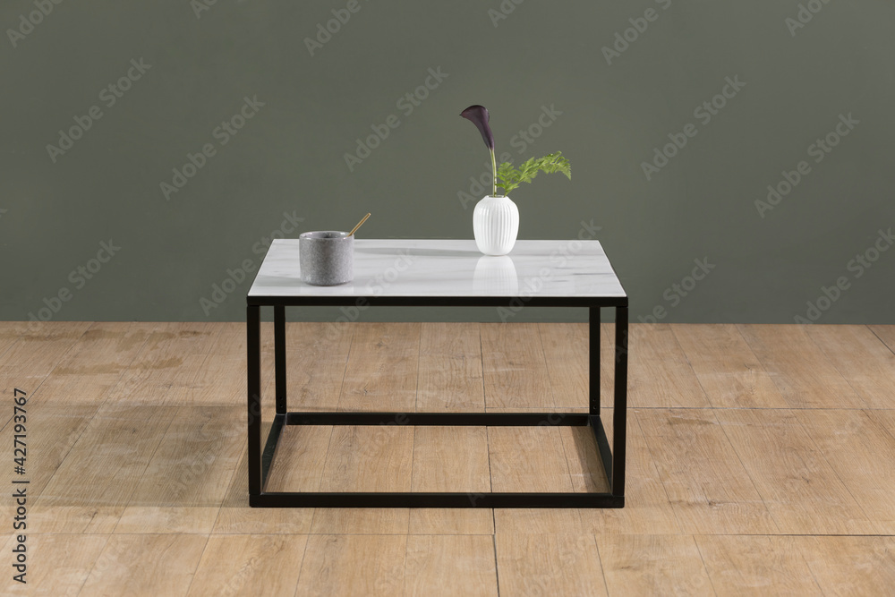 small stylish modern marble and steel coffee table photography in ...