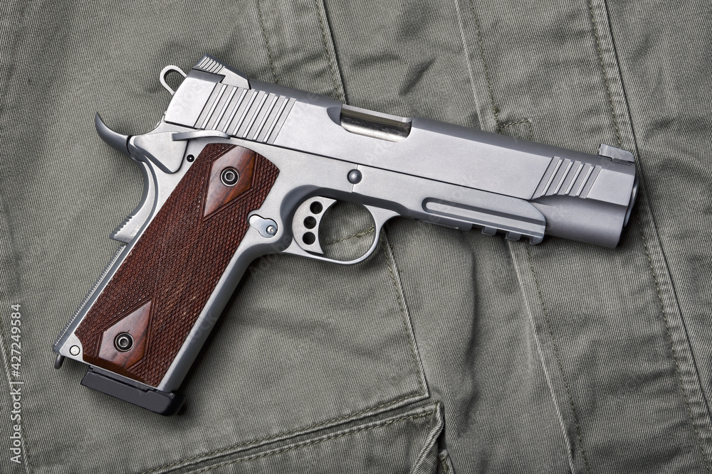 Weapons and military gun equipment for army, Semi-automatic handgun .45 ...