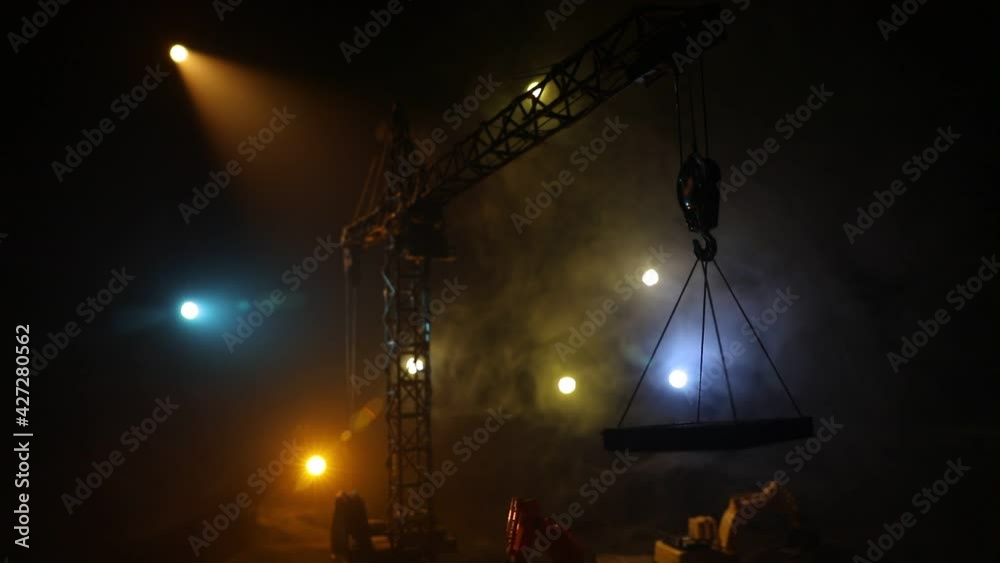 Abstract Industrial background with construction crane silhouette over ...