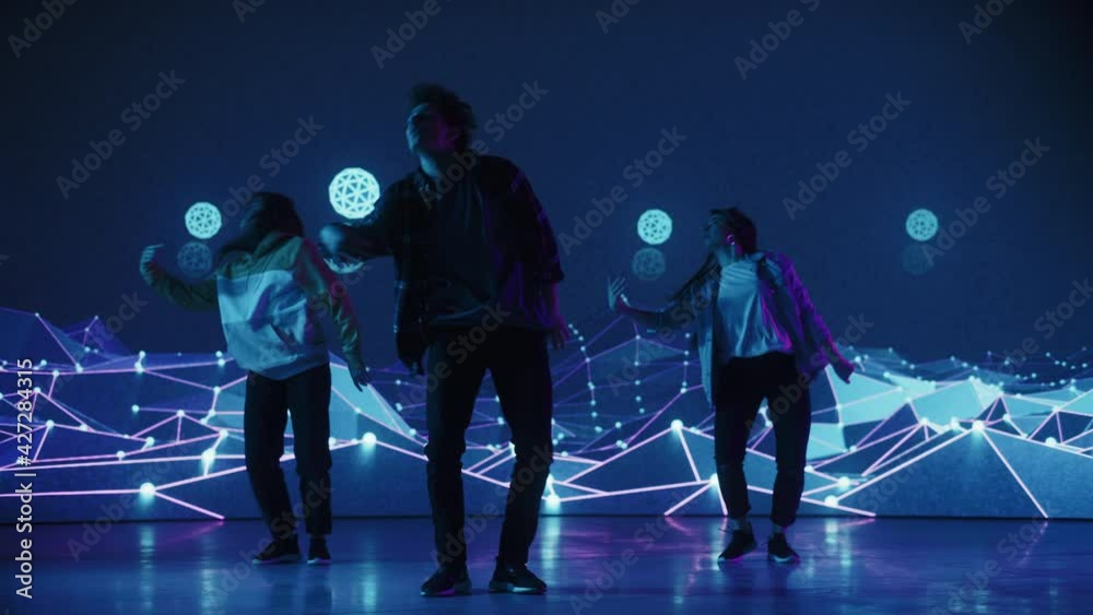 Diverse Group of Three Professional Dancers Performing a Hip Hop Dance ...
