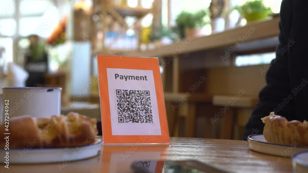 QR code touch-free payment display in the retail store. To use a QR ...