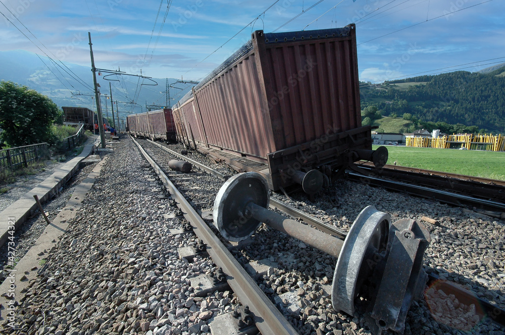 Massive freight train derailed along the tracks. Tracks, freight ...