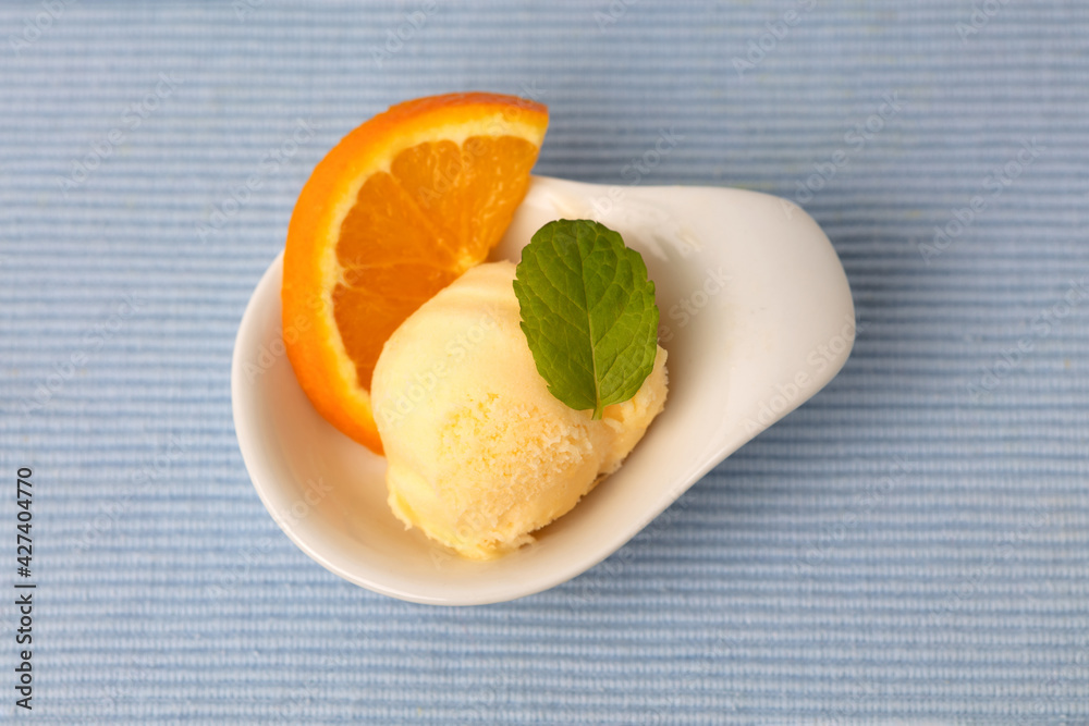 Fresh homemade scoop of orange sorbet from above Stock Photo | Adobe Stock