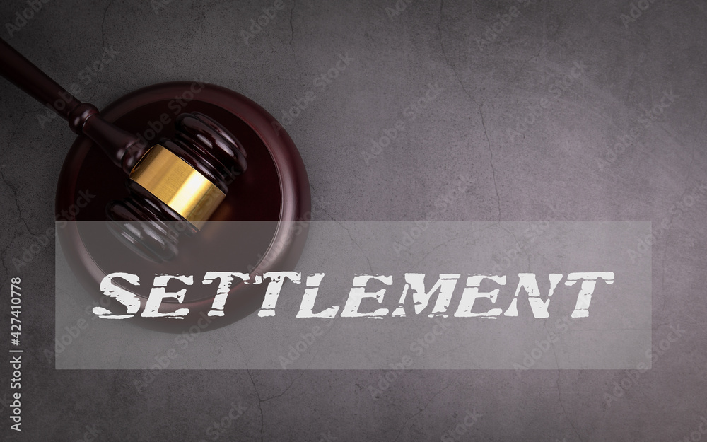Settlement. Conflict, dispute and mediation process. Judge's hammer on ...