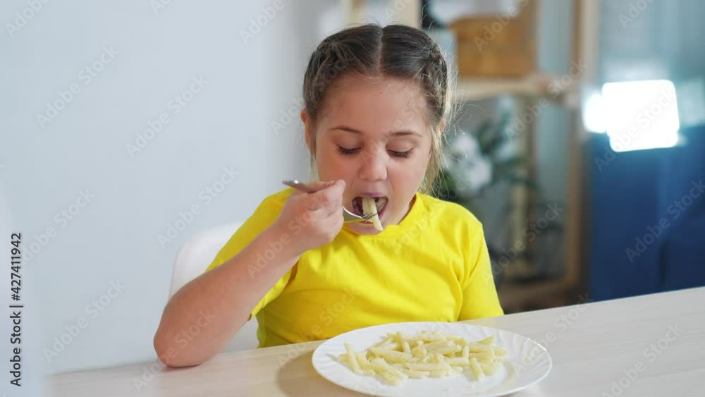 child eating pasta. healthy a food vegetarianism concept. girl child at ...