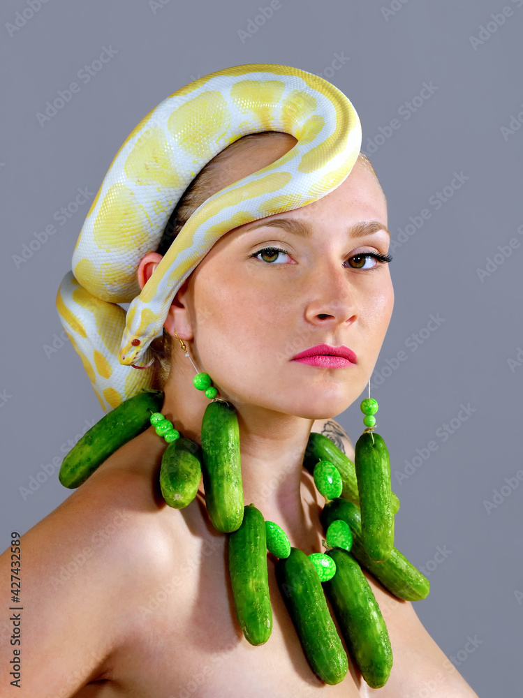 A Beautiful Young Woman Poses Nude For The Camera Her Earrings And Necklace Are Made Of Pickles