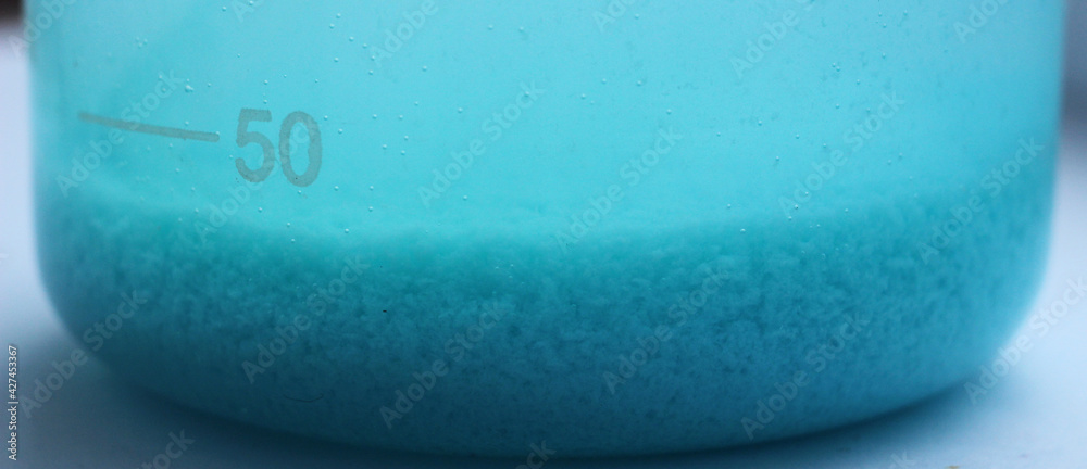 Blue precipitate of copper carbonate precipitated at the bottom of a ...