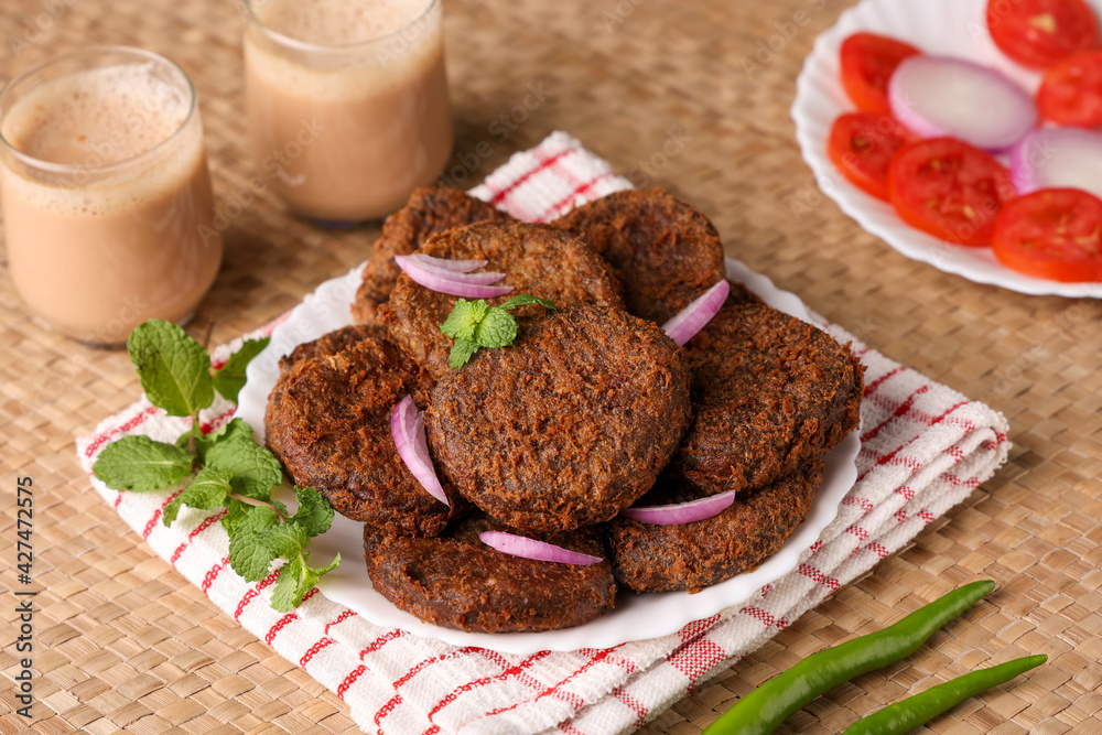 Many beef or chicken cutlet, tomato sauce Kerala South India. hot and ...