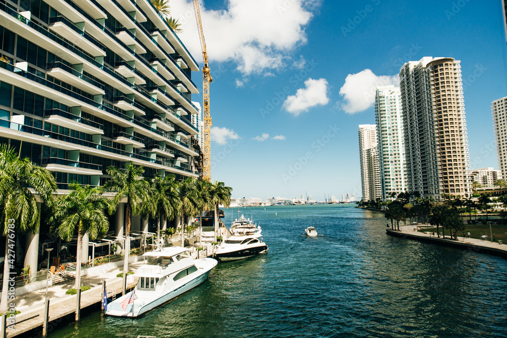 Downtown Miami along the Miami River inlet with Brickell Key in the ...