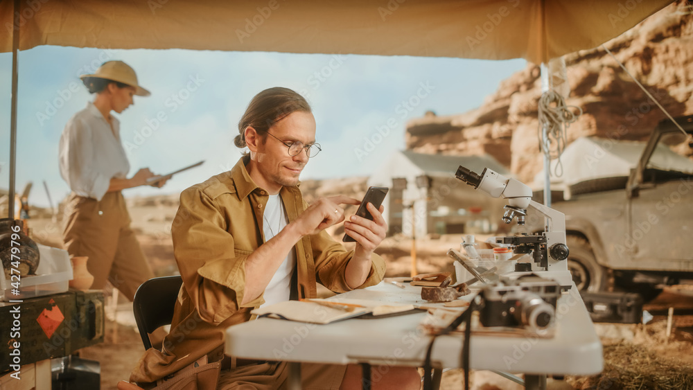 Archaeological Digging Site: Great Male Archaeologist Doing Research ...