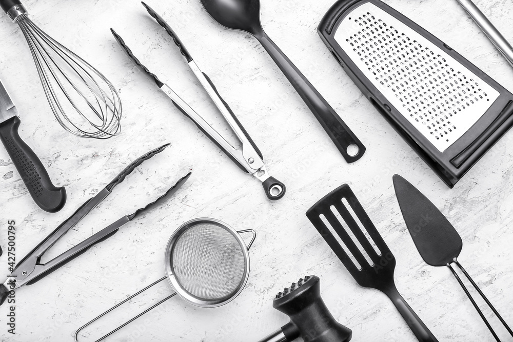 Set of kitchen utensils on light background Stock Photo | Adobe Stock