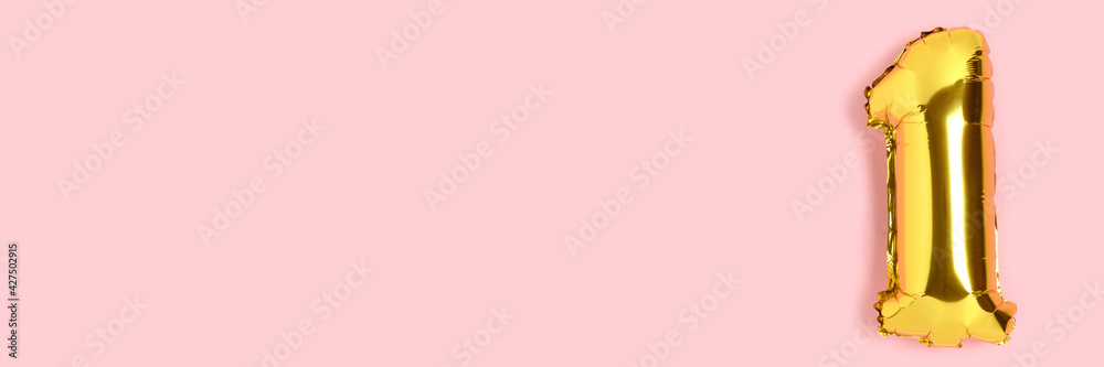 Banner with number 1 golden balloon with copyspace. One year ...