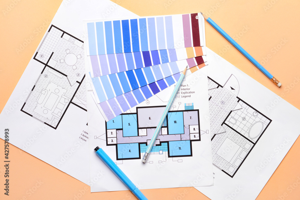 Plan of house, color samples and pencils on beige background Stock ...