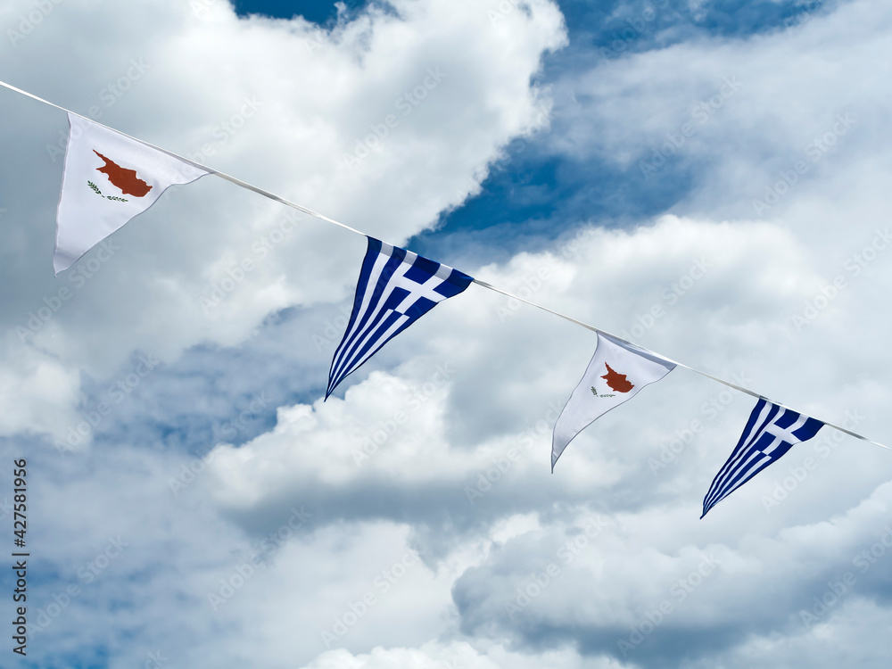 Greek and Cypriot national flags in fronf of sky Stock Photo | Adobe Stock
