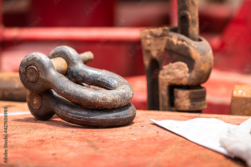 Iron steel shackles, heavy lifting equipment. Industrial object photo ...