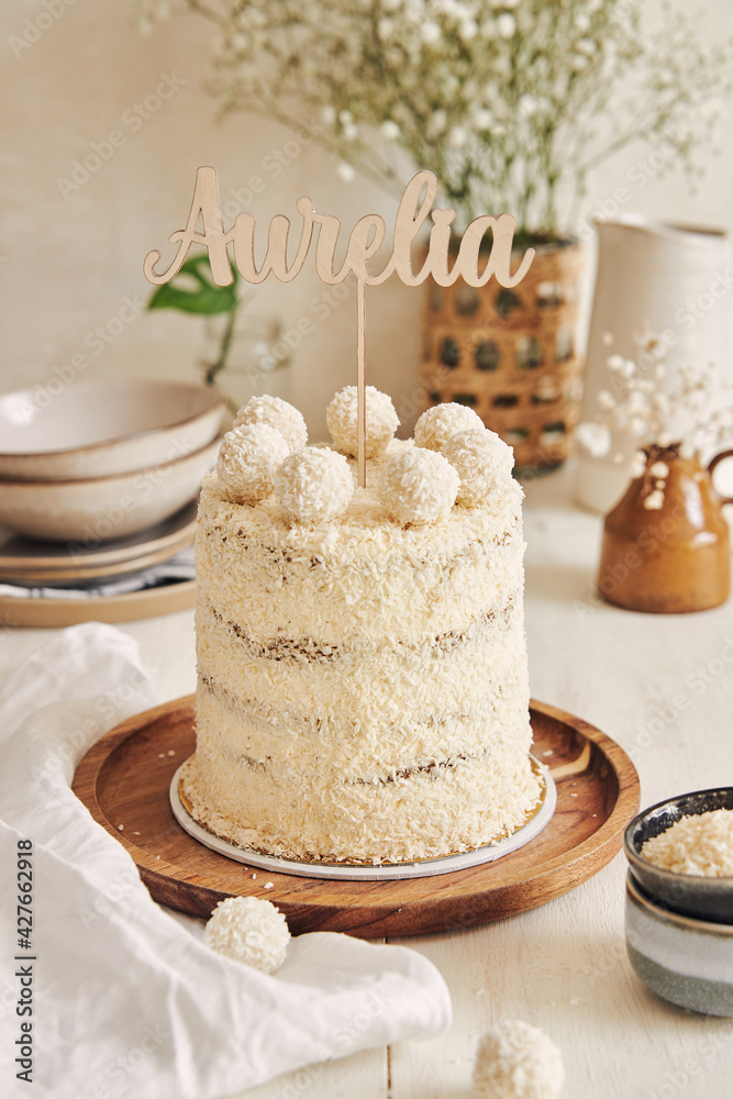 Delicious birthday cake for a woman named Aurelia with coconut flakes ...