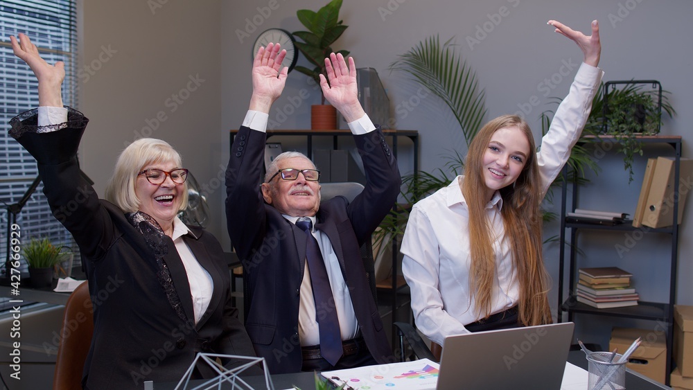 Diverse motivated business people rejoicing developing of business ...