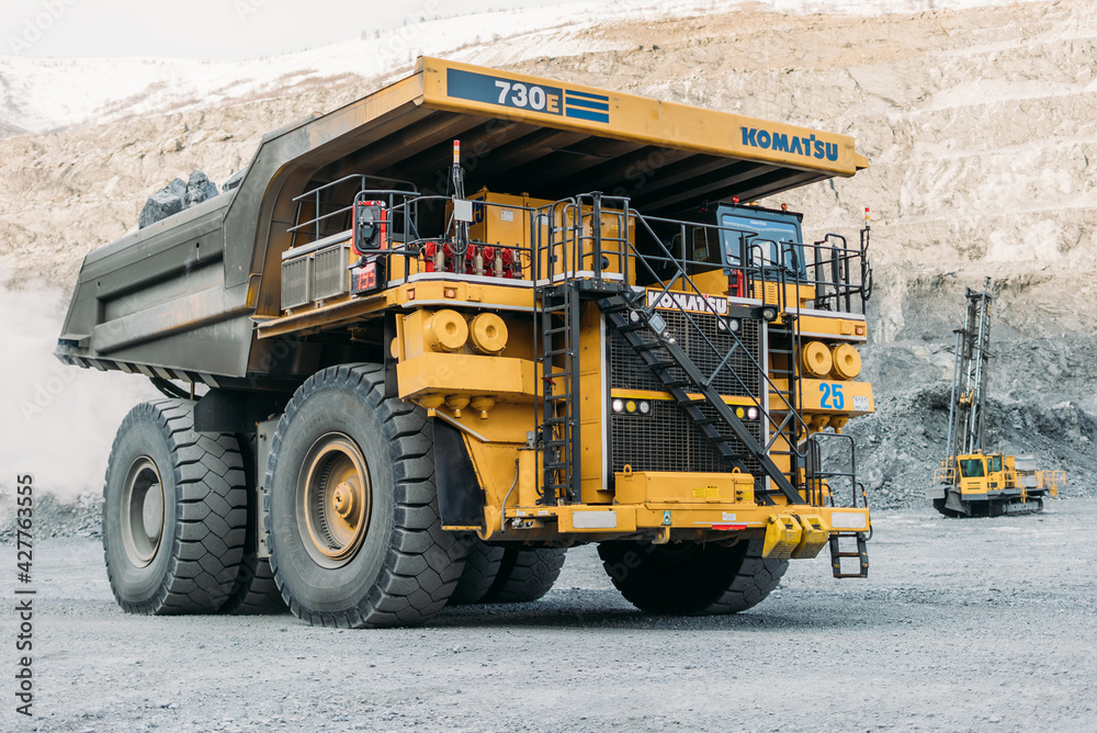 Komatsu 730e dump truck at a gold mining site. Stock Photo | Adobe Stock