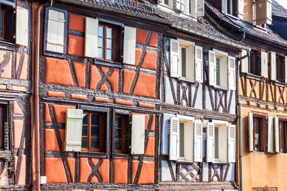 Old traditional colorful half-timbered houses in Colmar, Alsace region ...