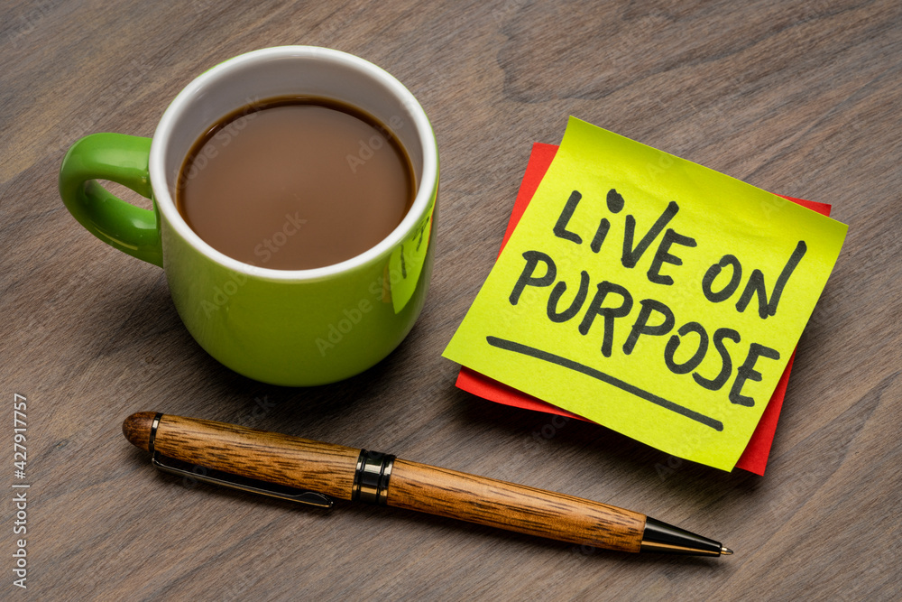 Live on purpose inspirational note - handwriting on a sticky note with ...