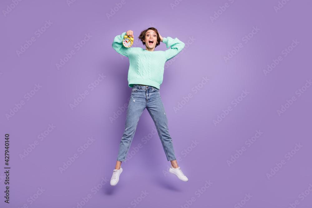 Full length body size photo of cheerful happy model jumping showing ...
