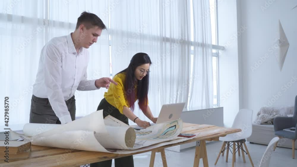 Creative Team Designers Working In Modern Office At Desk With ...