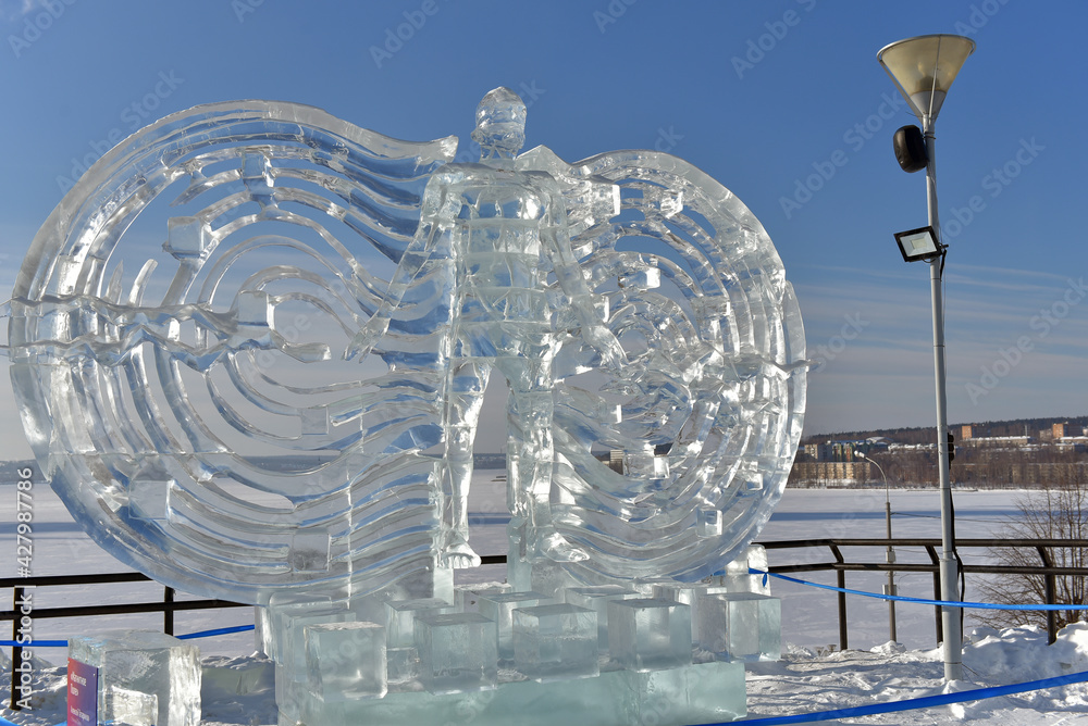 Exhibition of ice sculptures on the embankment of the city Stock Photo ...