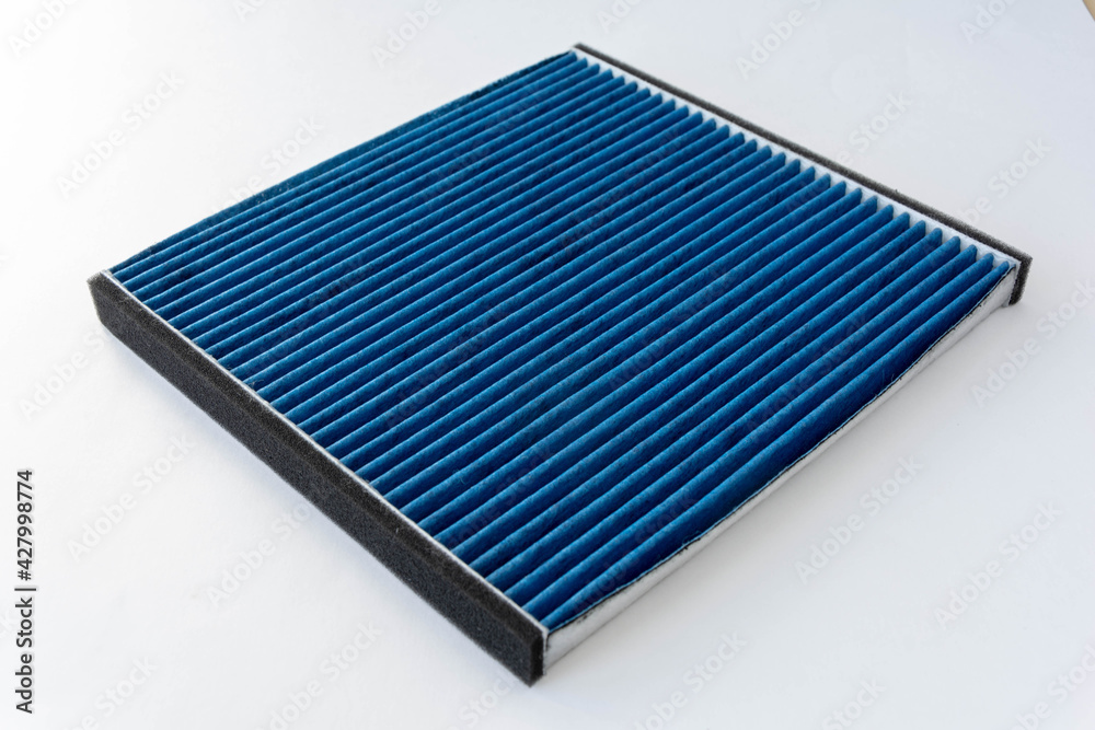 car interior air filter on a white background, cleaning the air from ...