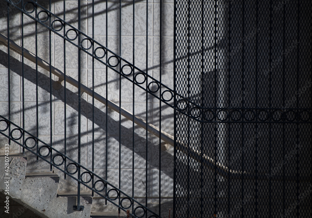 Black And White Vertical Lines And Circles Shadows Of Wrought Iron