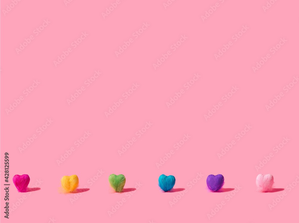 Six different hearts covered with feathers in different colors - red ...