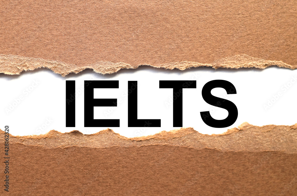 text inside torn brown paper. white sheet with black font. IELTS Stock ...