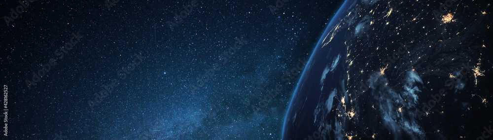 Beautiful blue planet earth with night city lights on the starry sky ...