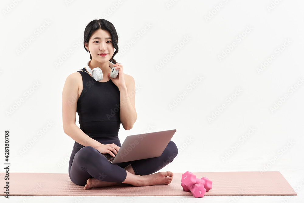 Asia korean girl long haired beautiful pilates or yoga athlete does a ...