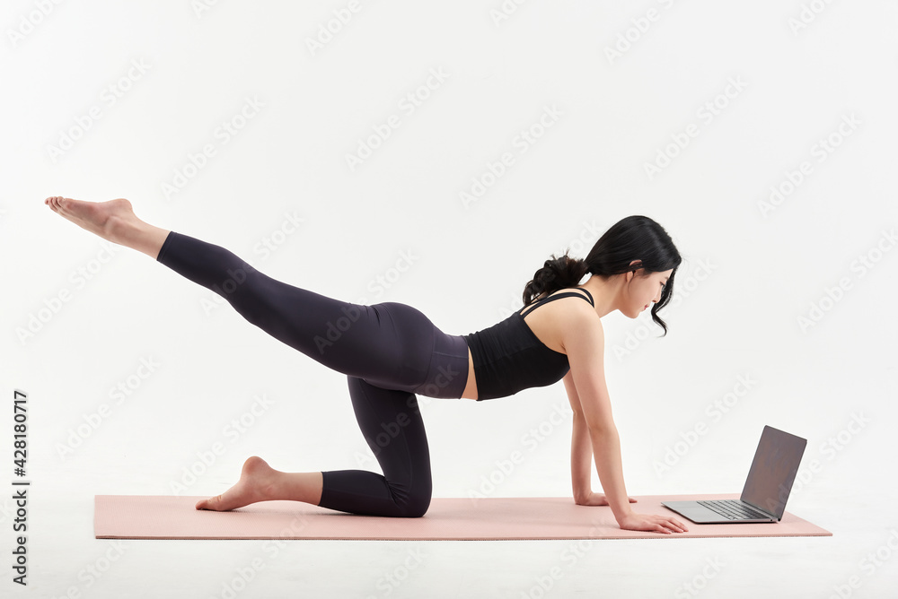 Asia korean girl long haired beautiful pilates or yoga athlete does a ...