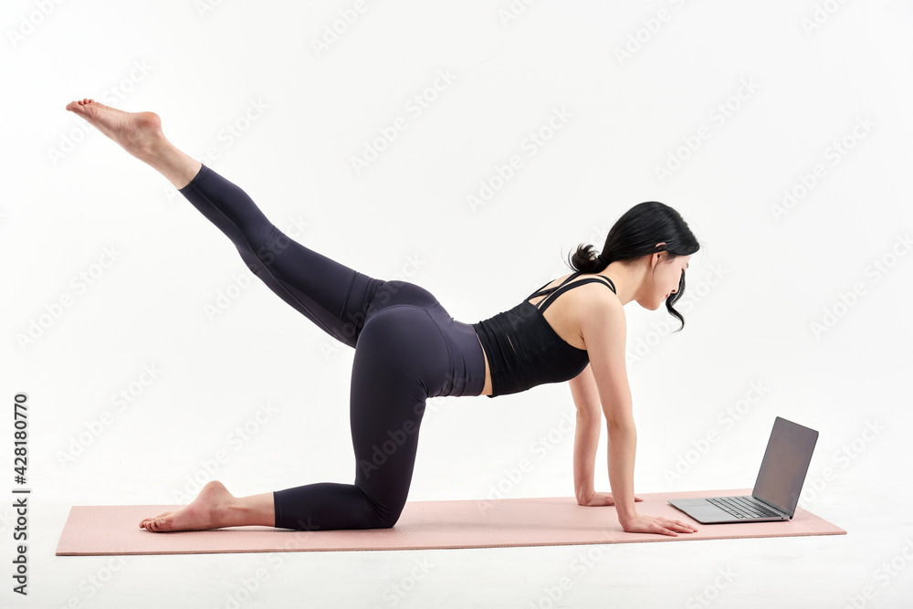 Asia korean girl long haired beautiful pilates or yoga athlete does a ...