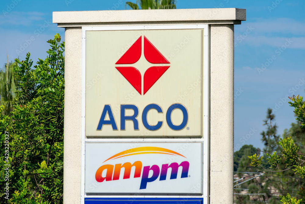 ARCO ampm sign and logo advertises gas station and a convenience chain ...
