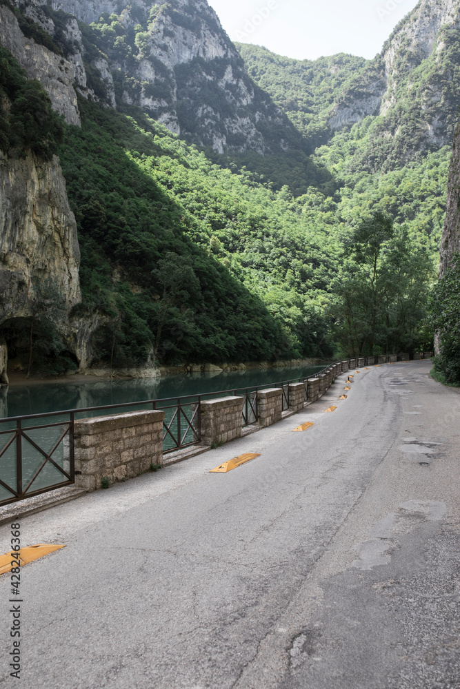 The street that pass through the landscape and unspoiled nature at the ...