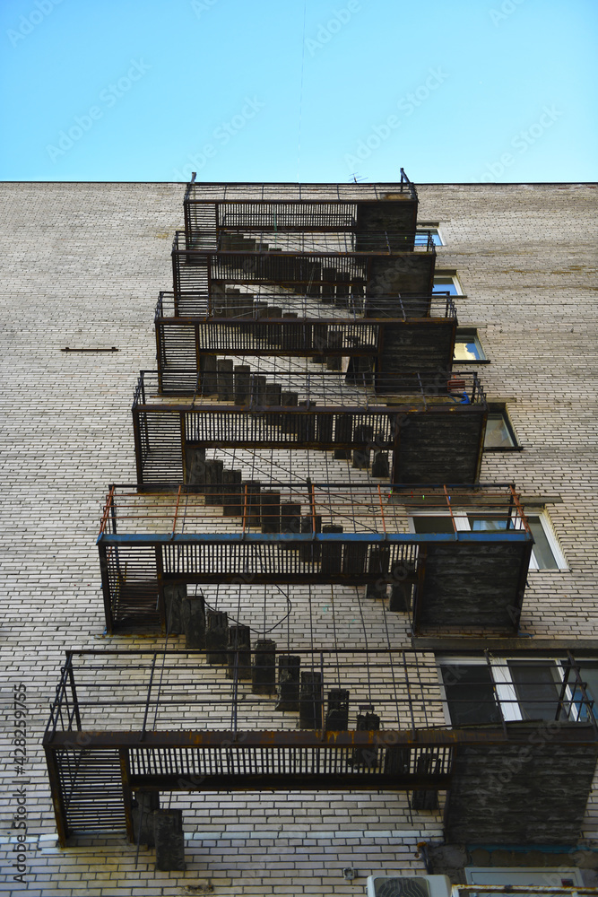 Architectural solution of an external, metal staircase for evacuation ...