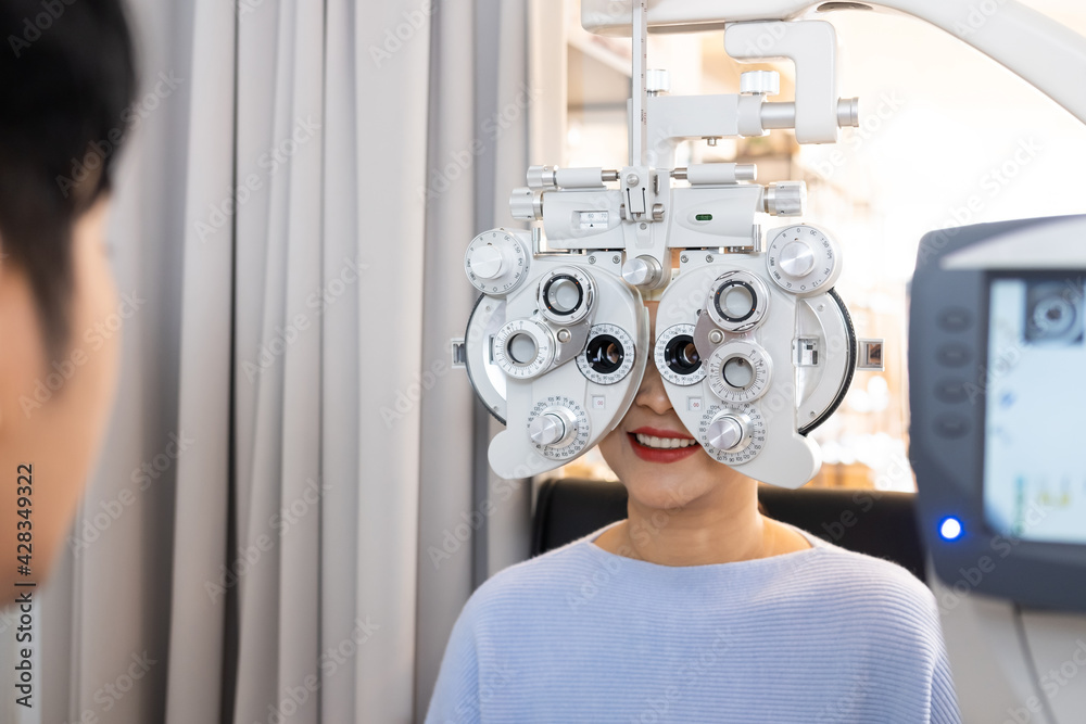 Selective focus at Optometry frame equipment. While doctor using ...