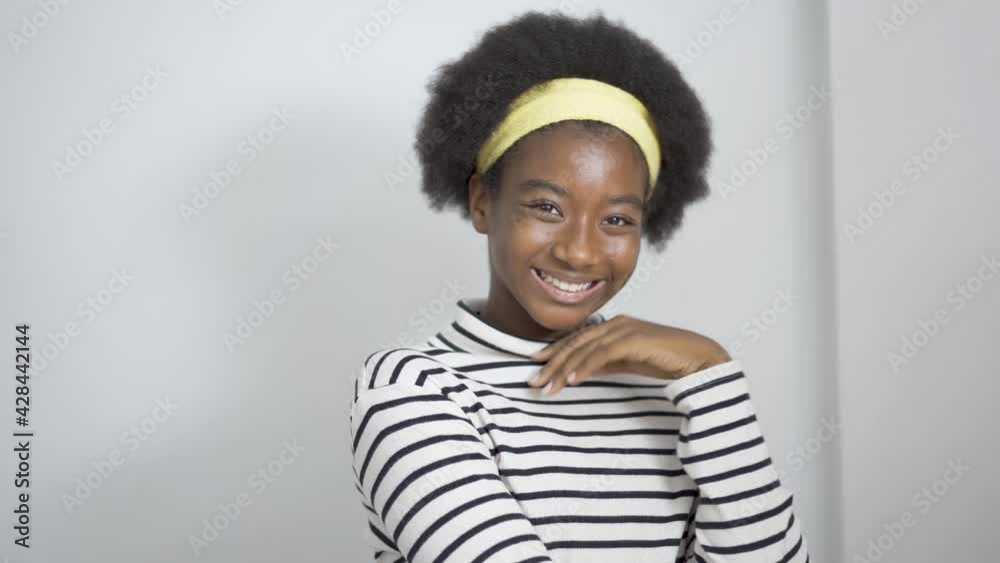 Smiling attractive Portrait lovely of African american teen school girl ...
