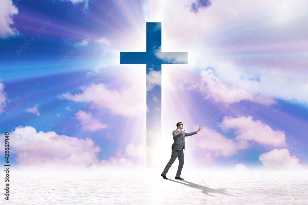 Religious concept with cross and lonely man Stock Photo | Adobe Stock
